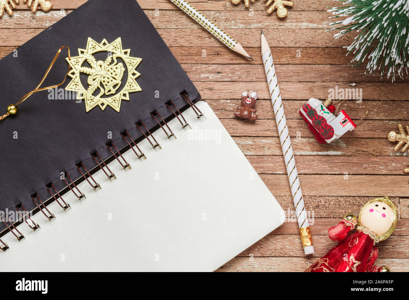 Top view of blank notebook on grunge wood background with Christmas ...
