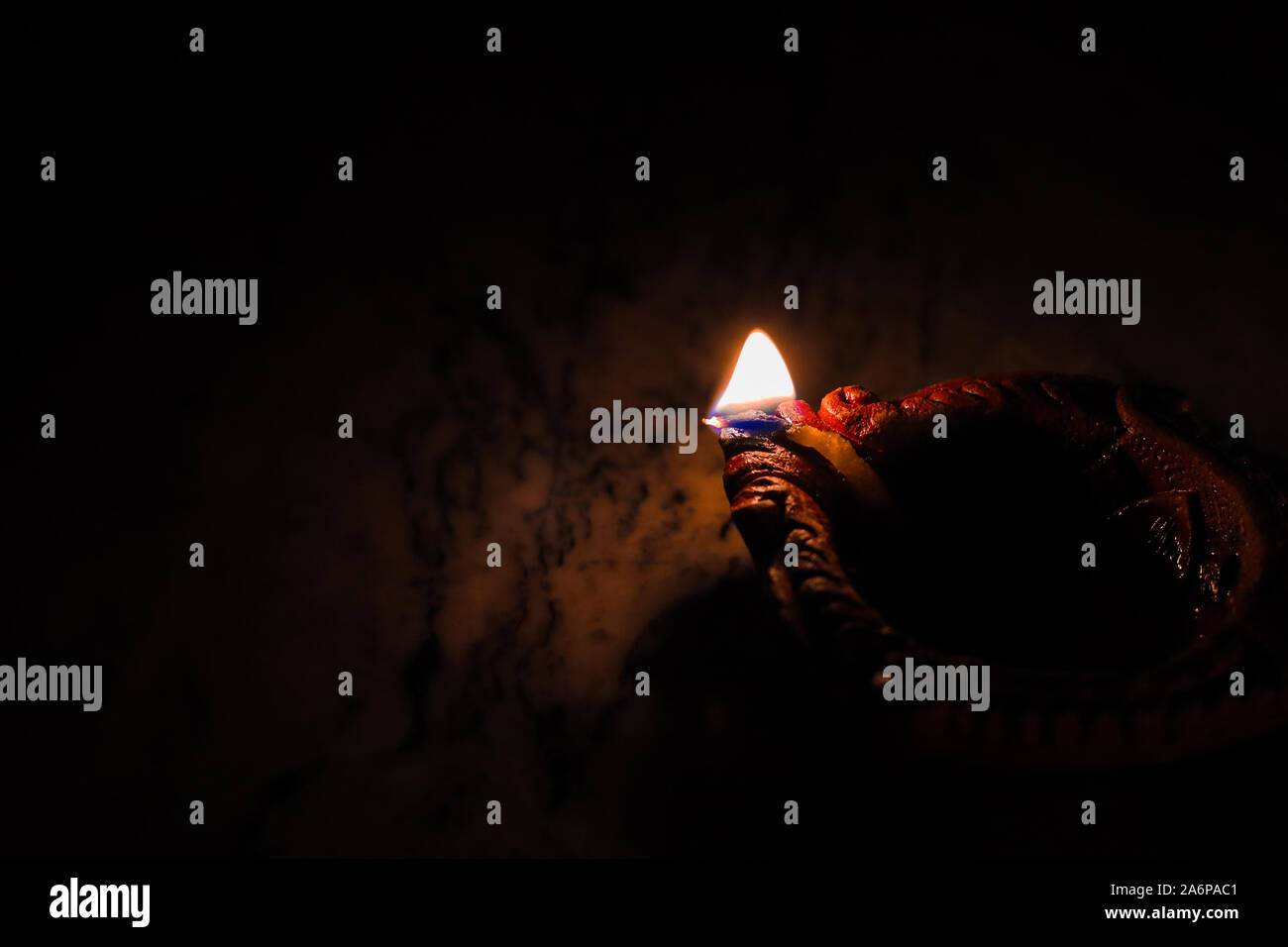 Burning earthen lamp hi-res stock photography and images - Alamy
