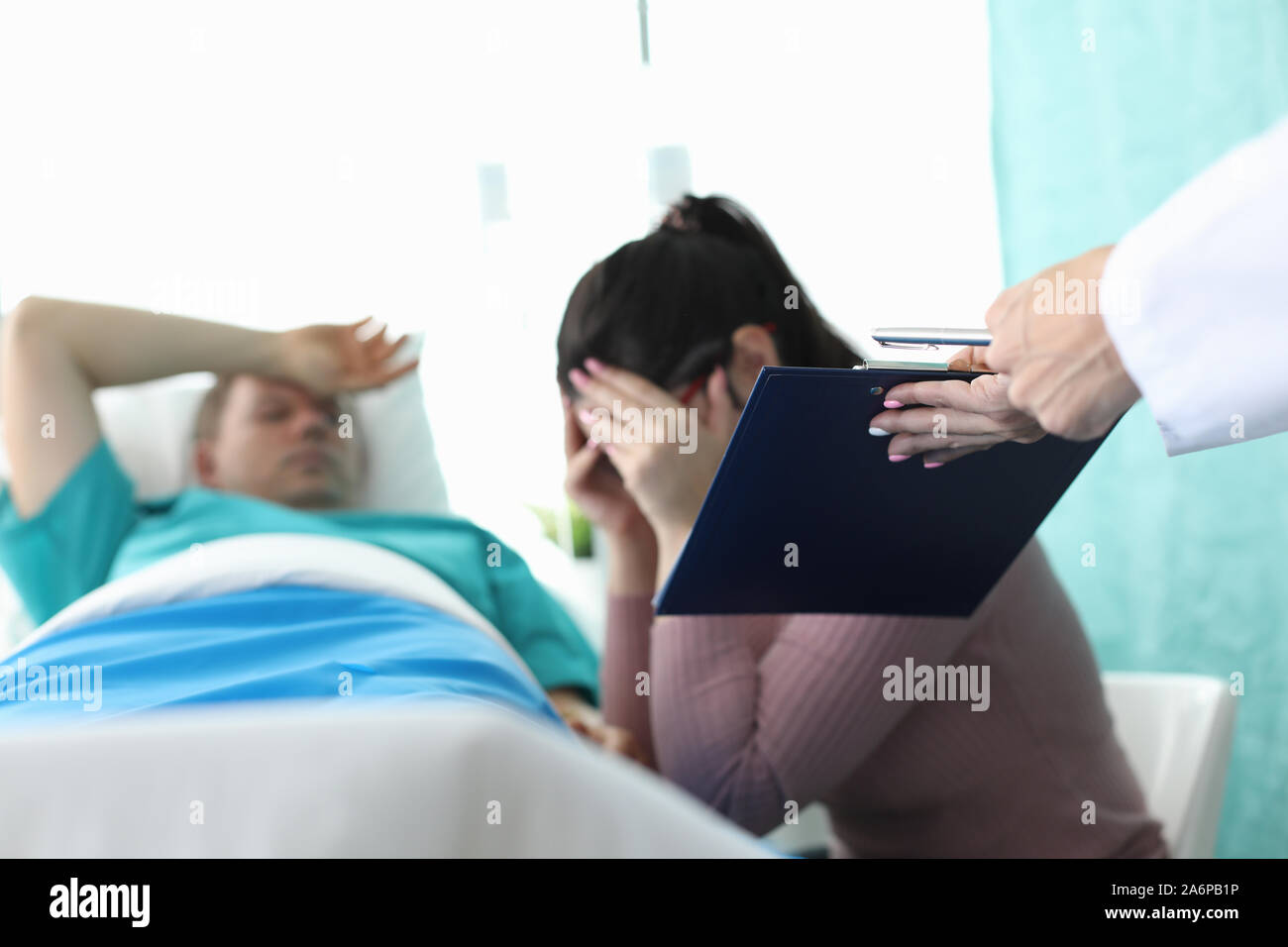 Female doctor brings documents crying with grief Stock Photo - Alamy
