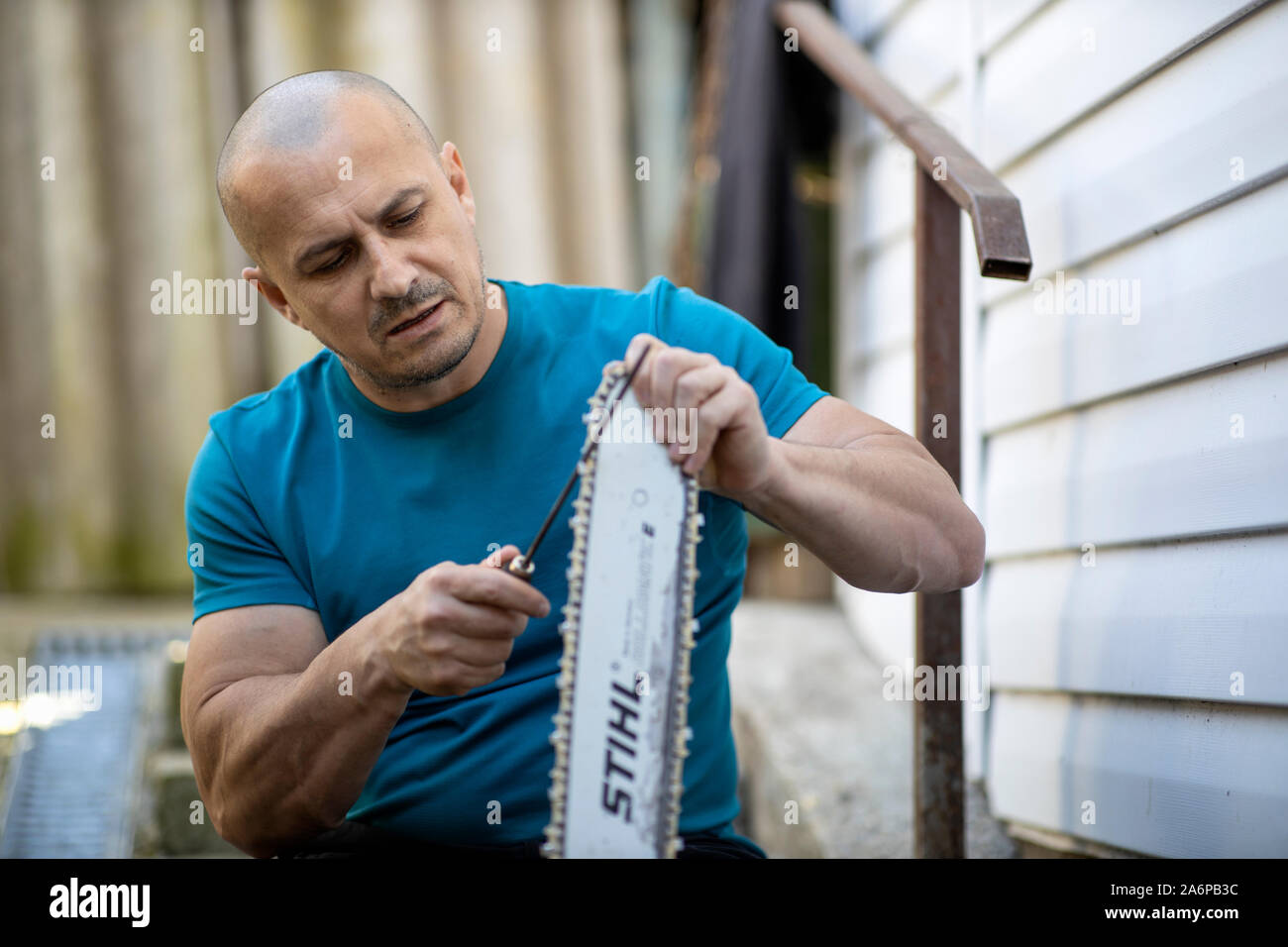 Two man chain saw hi-res stock photography and images - Alamy