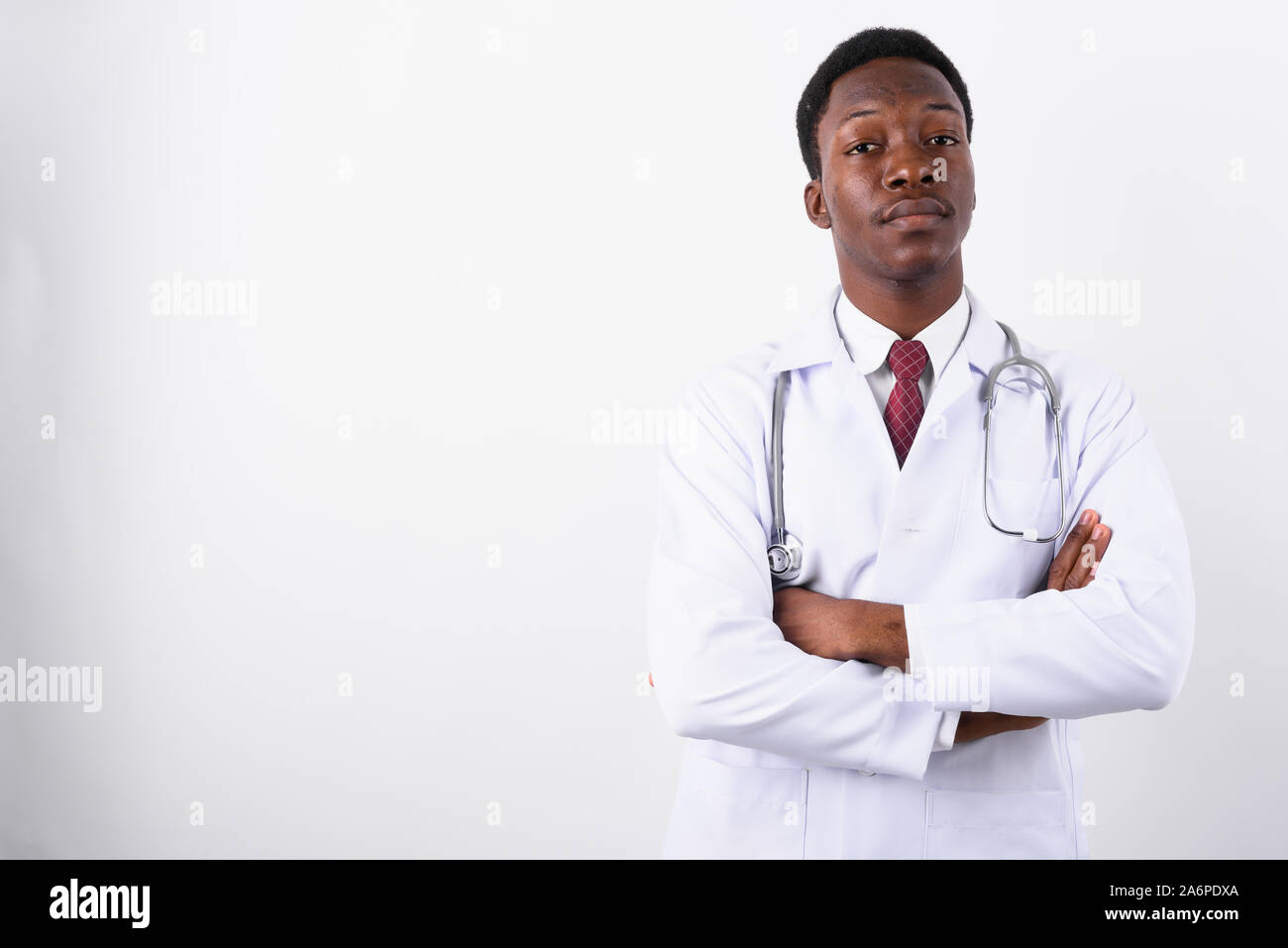Young handsome African man doctor against white background Stock Photo ...