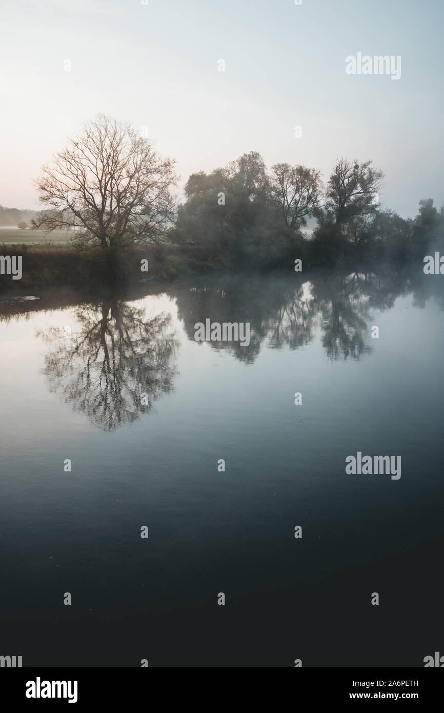 Mirror reflection in the river Stock Photo - Alamy