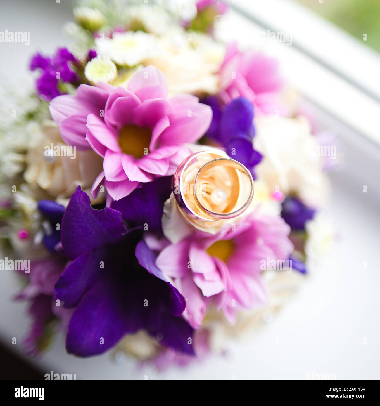 Wedding theme. Close-up view of wedding rings. Beautifully decorated ...