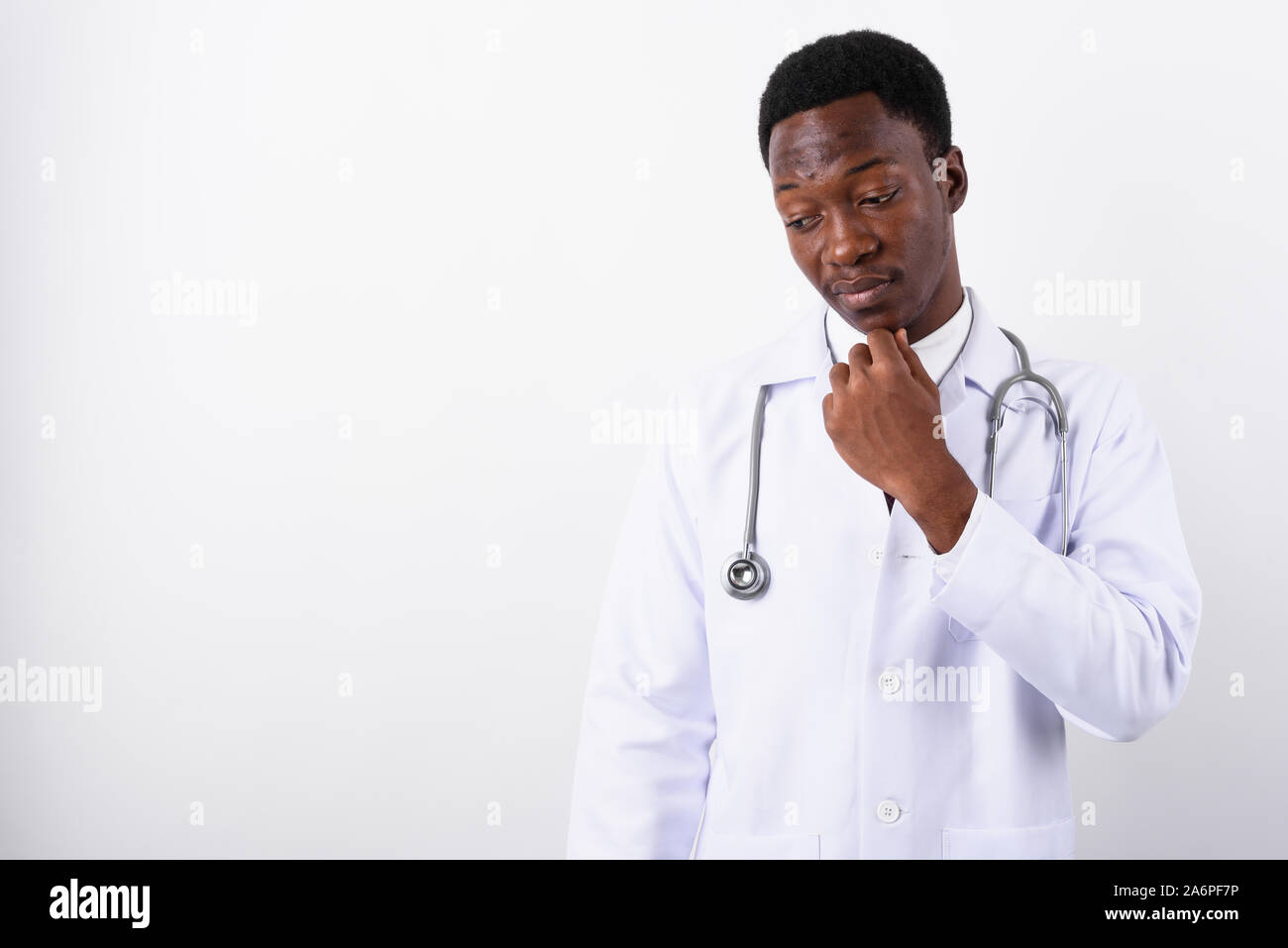 Young handsome African man doctor against white background Stock Photo ...
