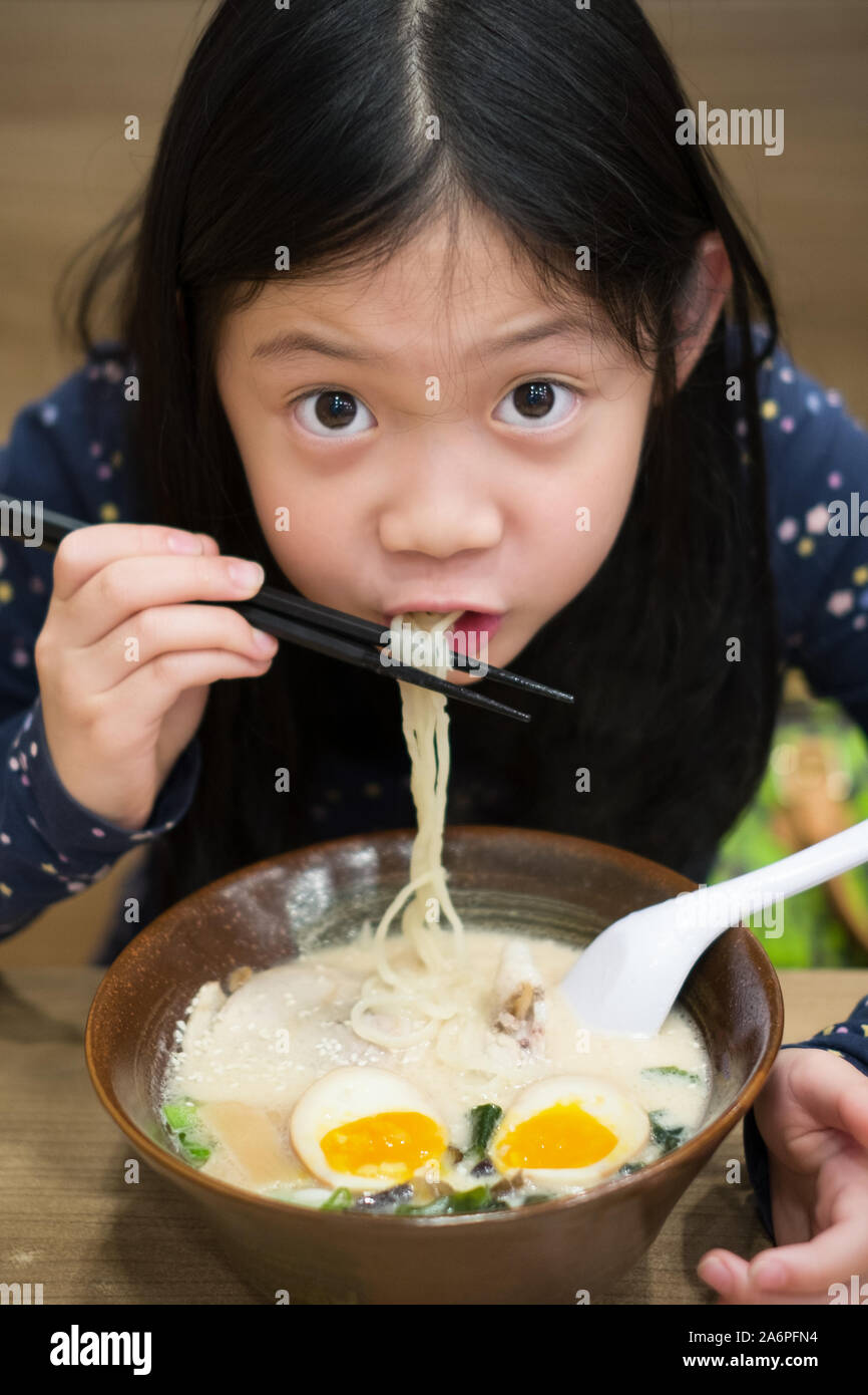 Asian Girl Eating Ramen Stock Photo - Alamy