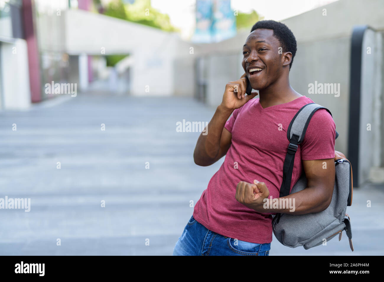 African american young tourist using hi-res stock photography and ...