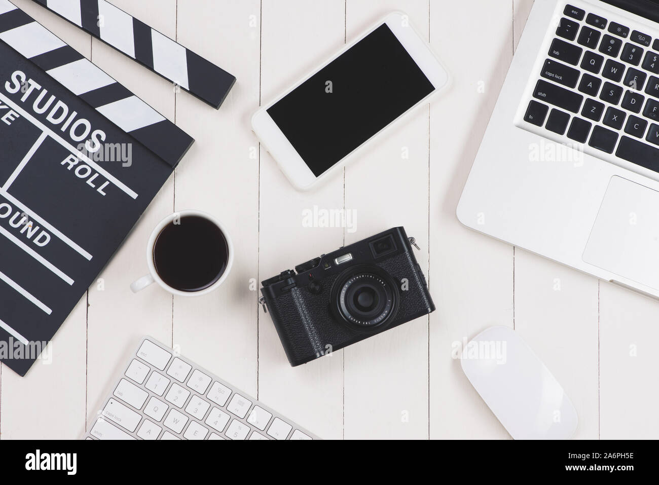 Film director desk with movie clapper board. Top view Stock Photo - Alamy