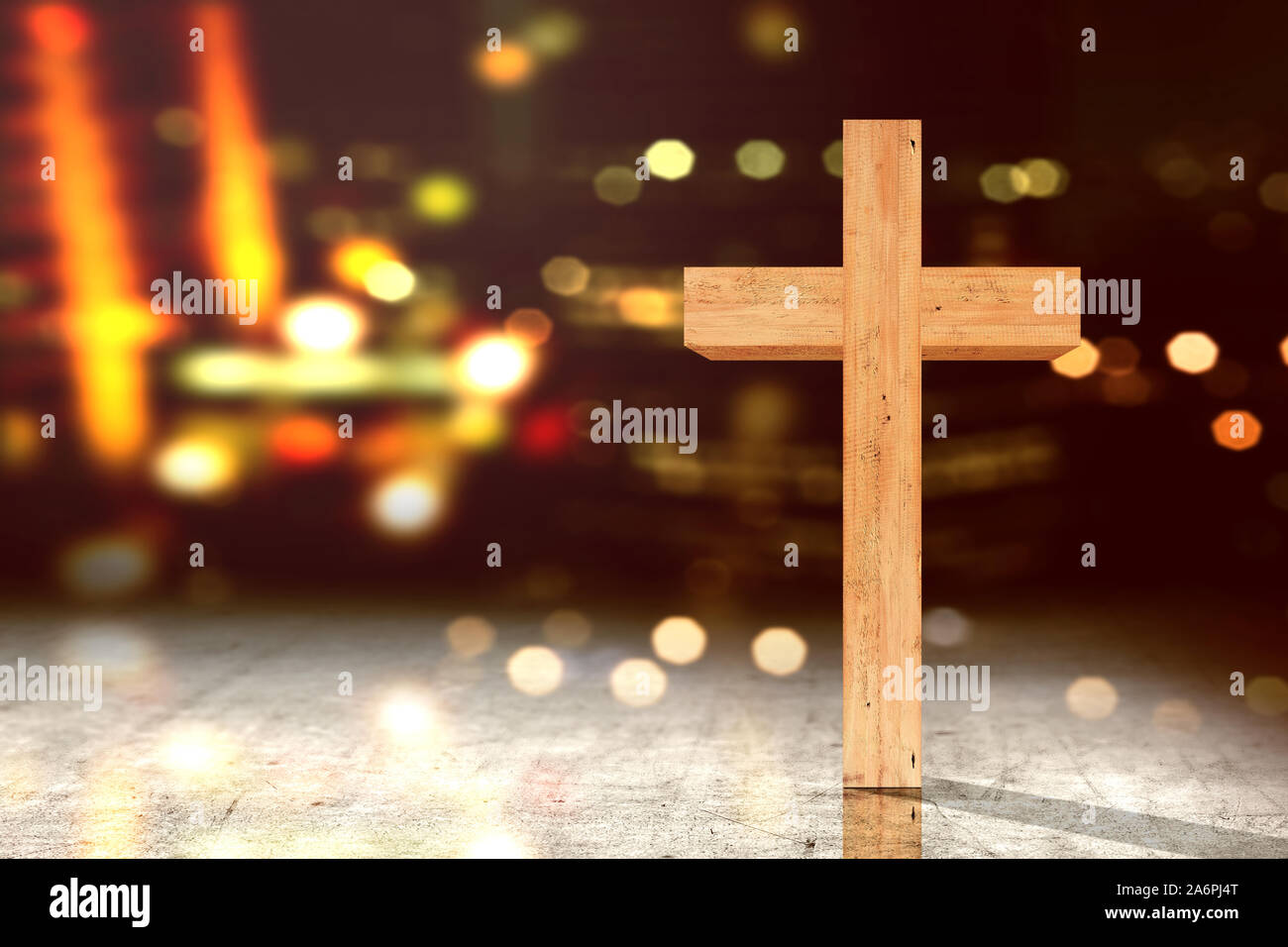 Christian cross on the floor with blurred lights background Stock Photo ...