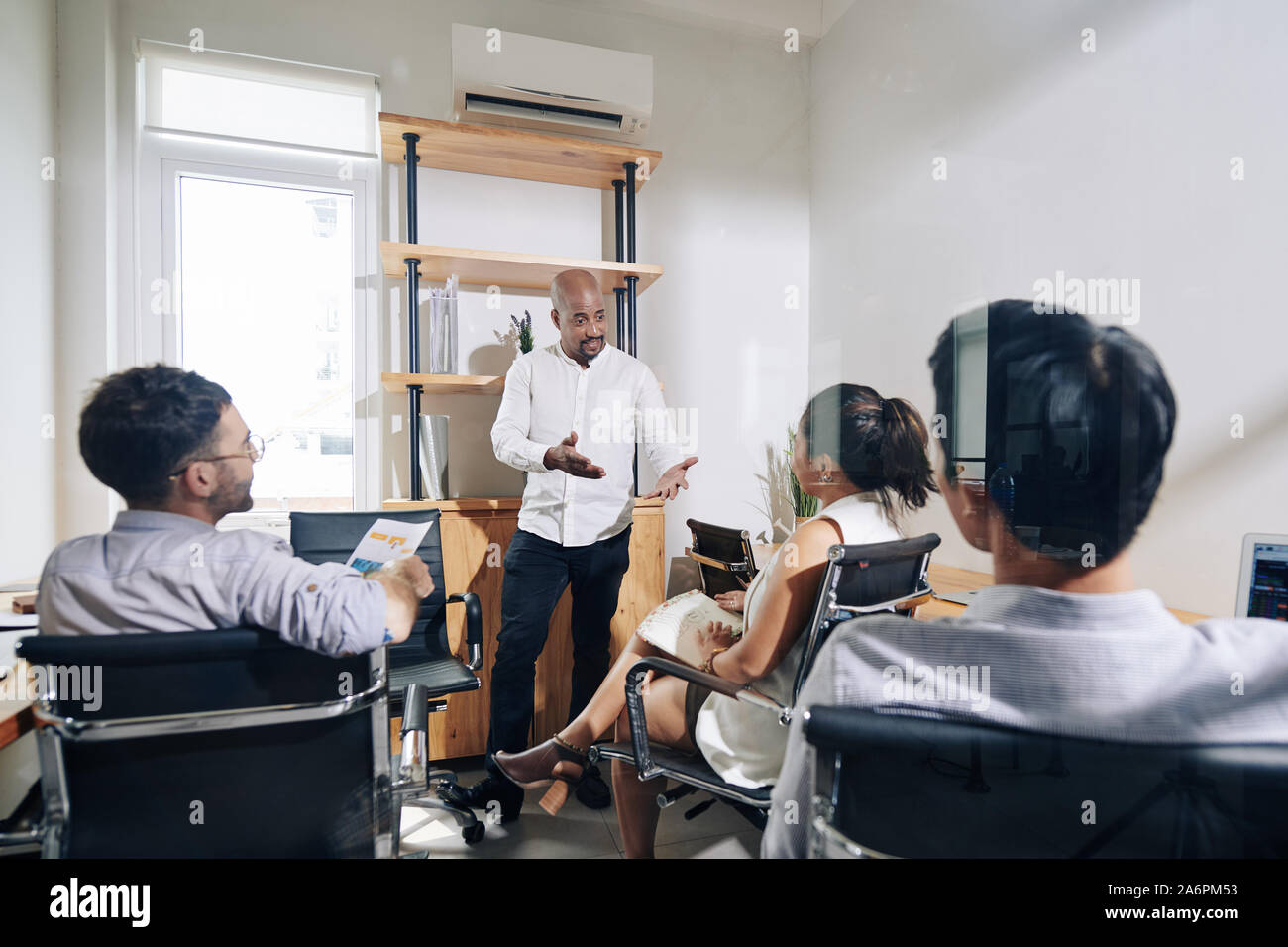 Explaining new strategy hi-res stock photography and images - Alamy