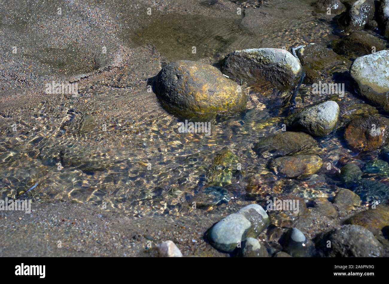 Close-up View of Colorful Pebbles, Coarse Sand in Water Waves Stock ...