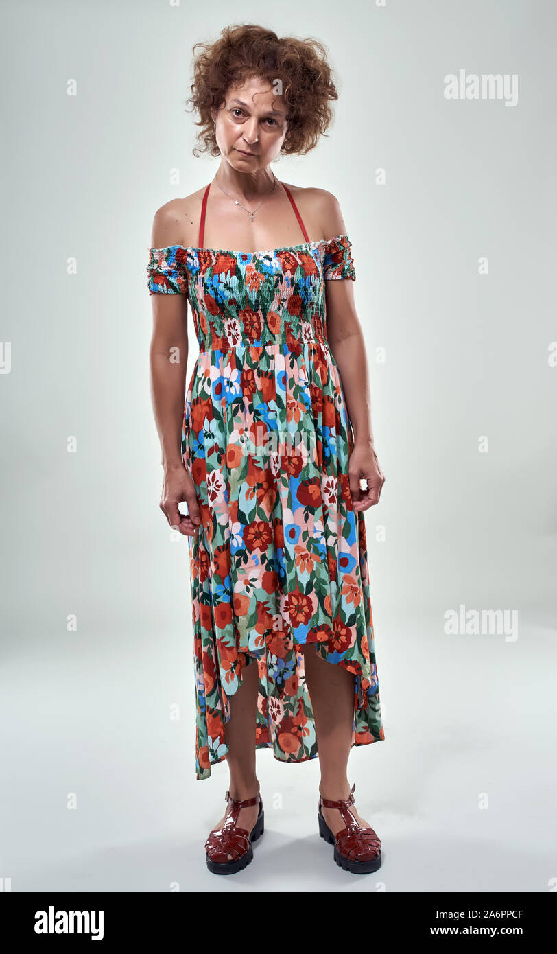 Full length studio portrait of a mature woman Stock Photo - Alamy