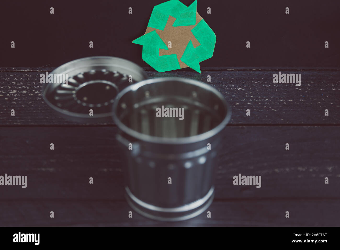 environmental awareness concept, garbage bin with recycle symbol ...