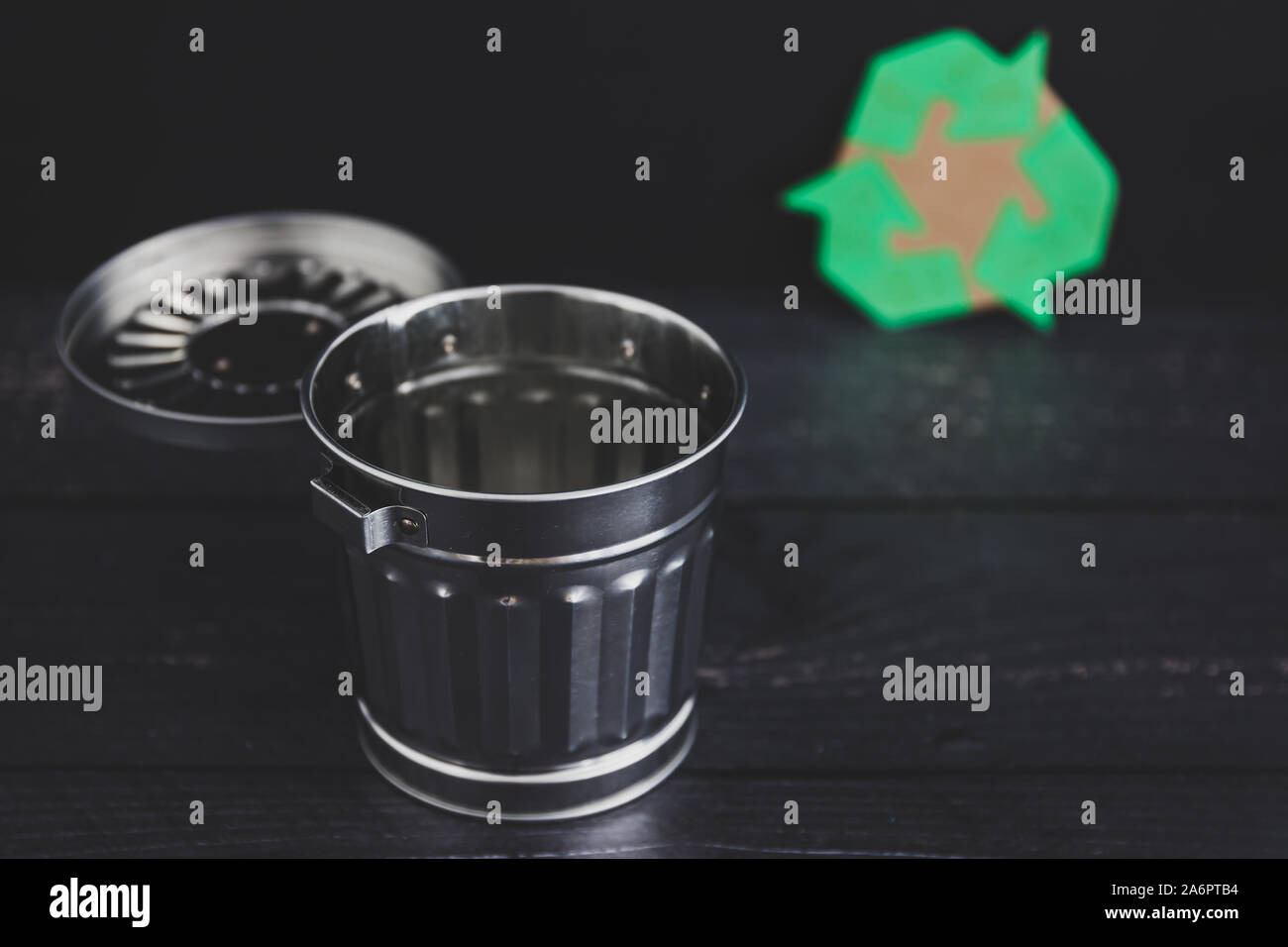 environmental awareness concept, garbage bin with recycle symbol ...