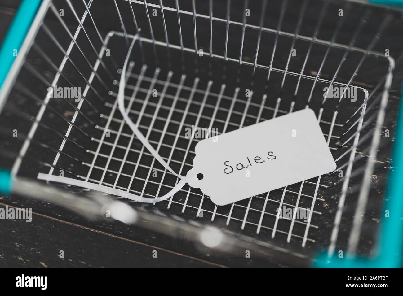 sales strategy and customer purchases, shopping basket with price tag ...