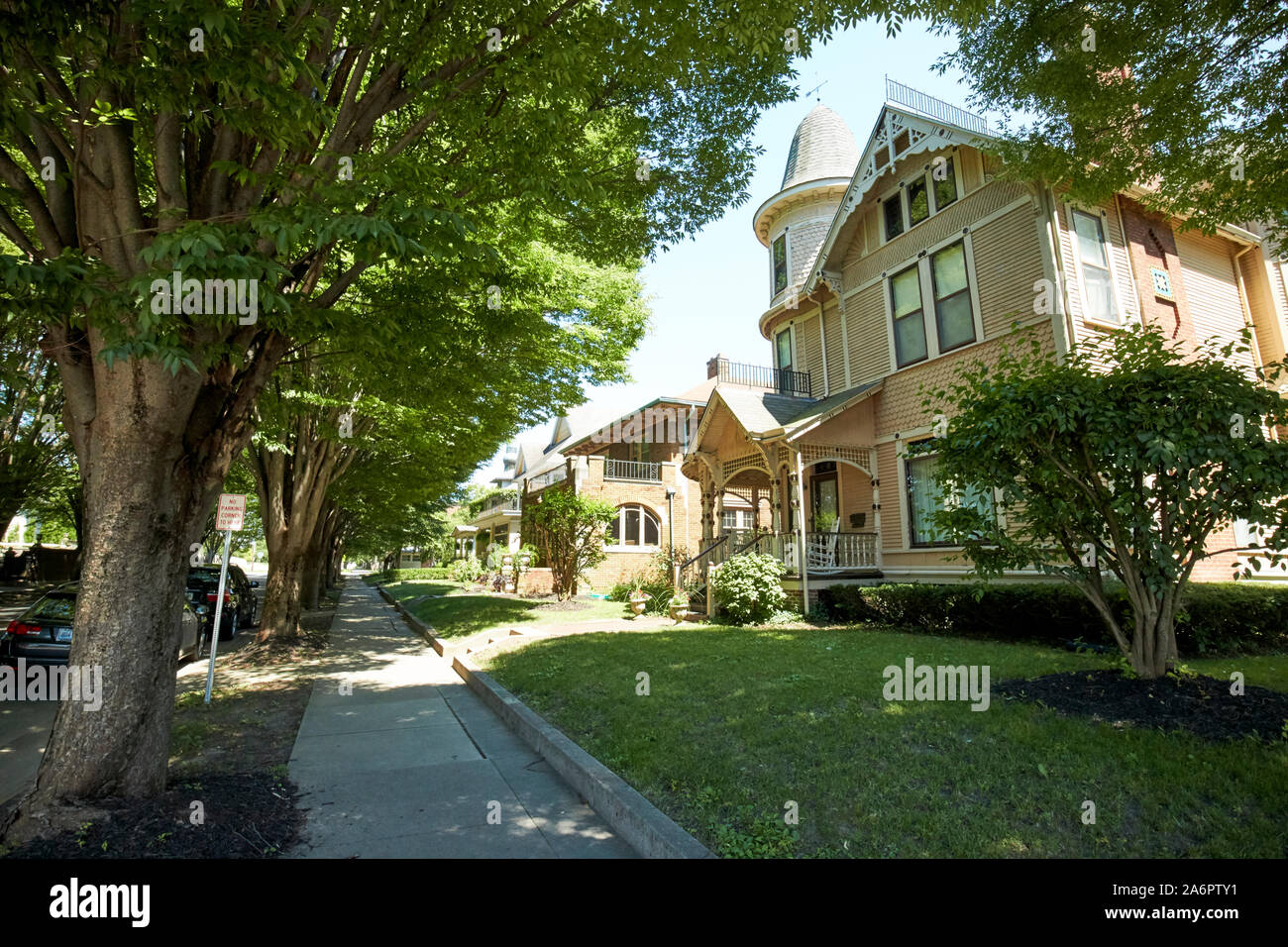 the prall house and tree lined 5th street with old style architectural ...