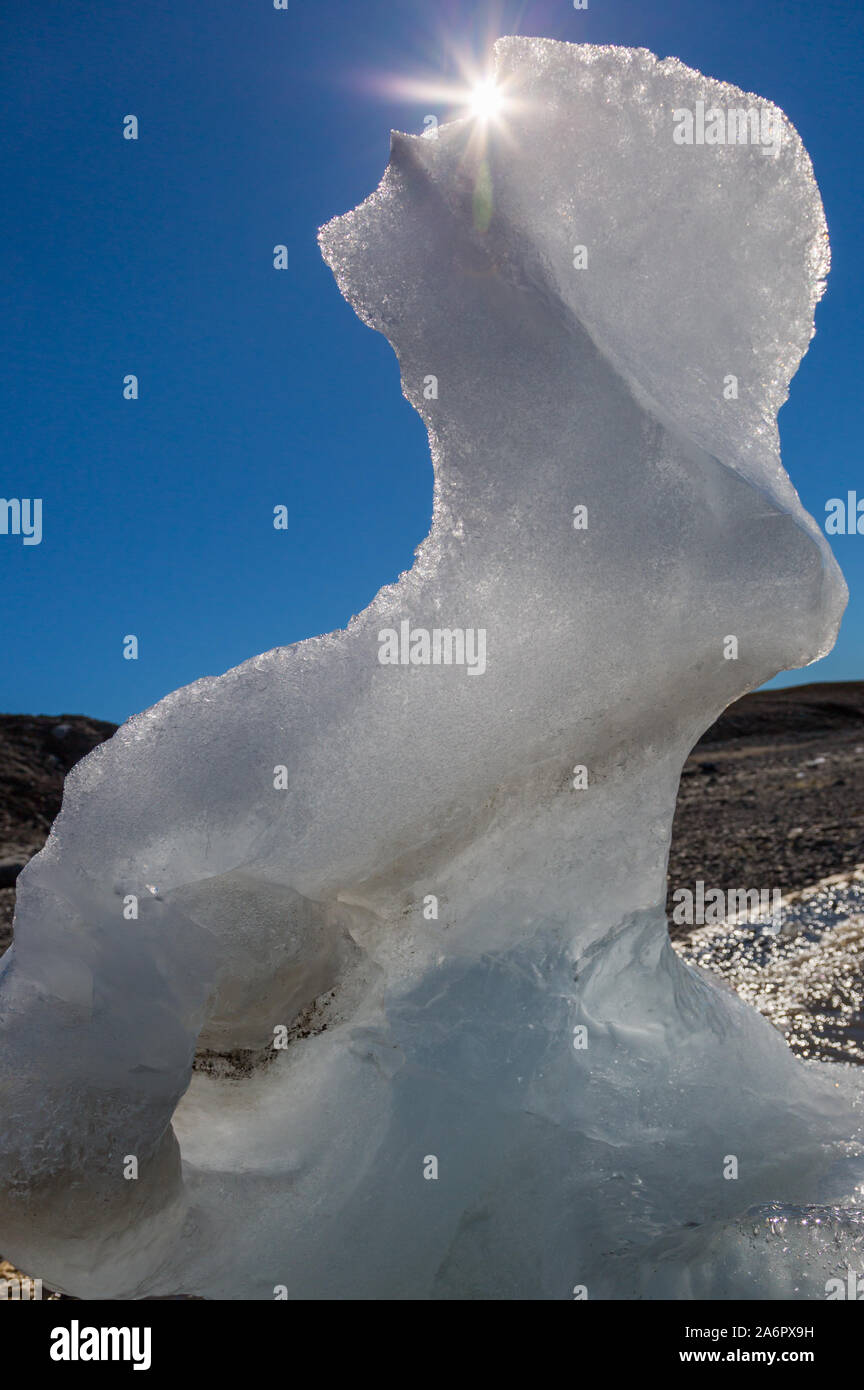 melting peace of glacier ice with sun, sunbeams and blue sky Stock ...