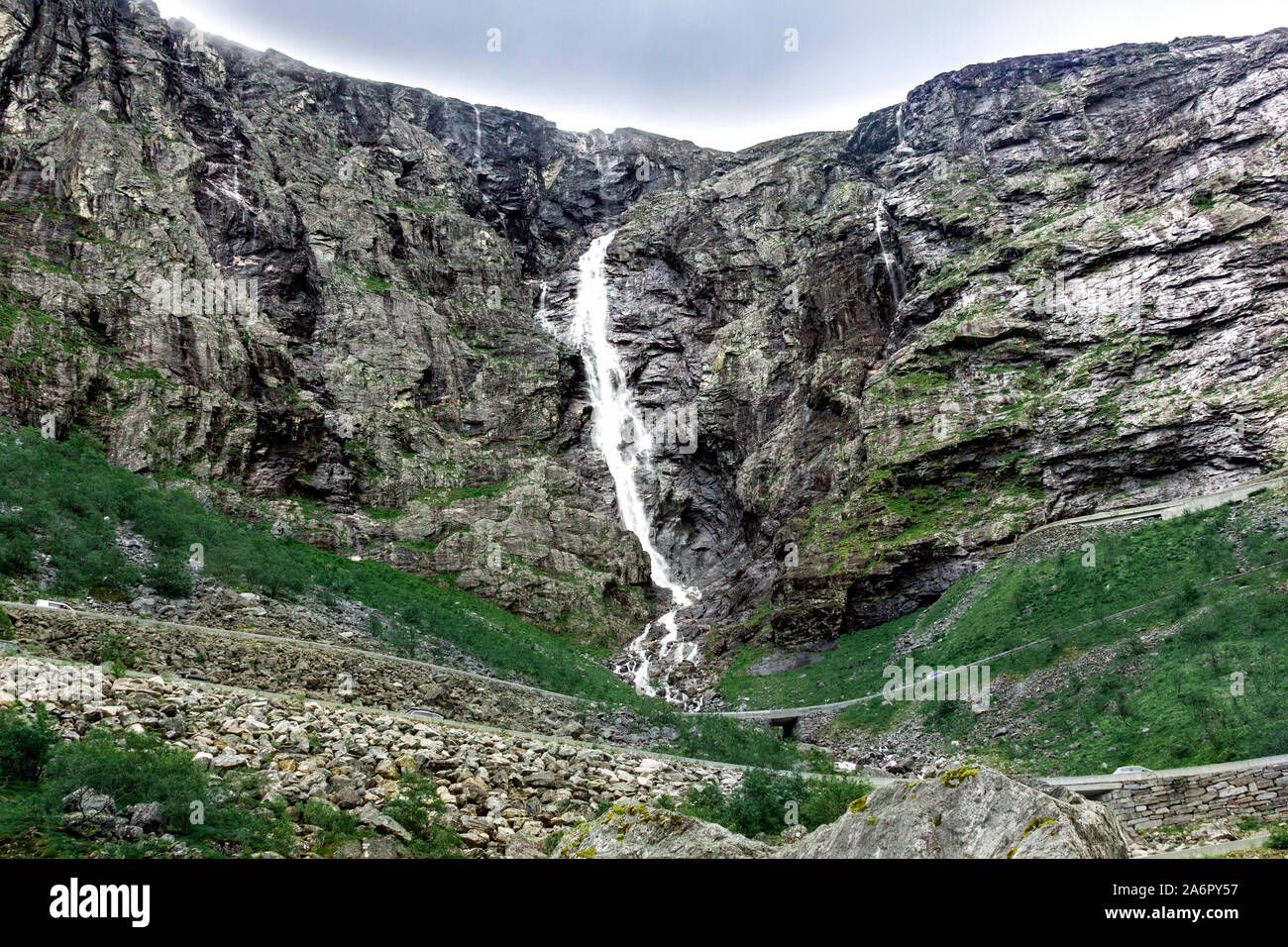 Waterfall between two cliffs Stock Photo - Alamy