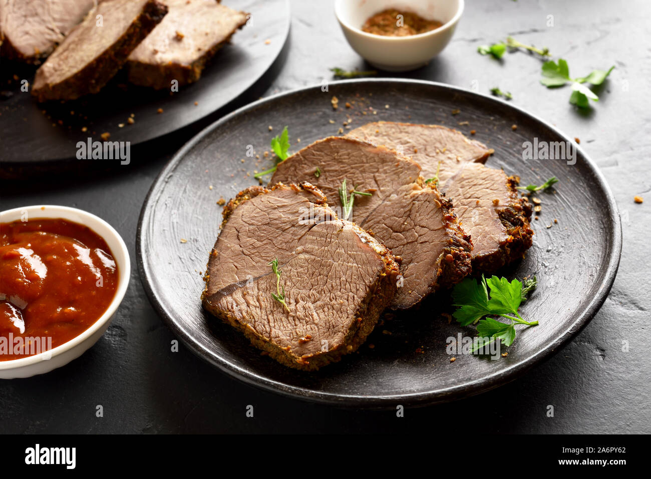 Sliced grilled roast beef on plate Stock Photo - Alamy