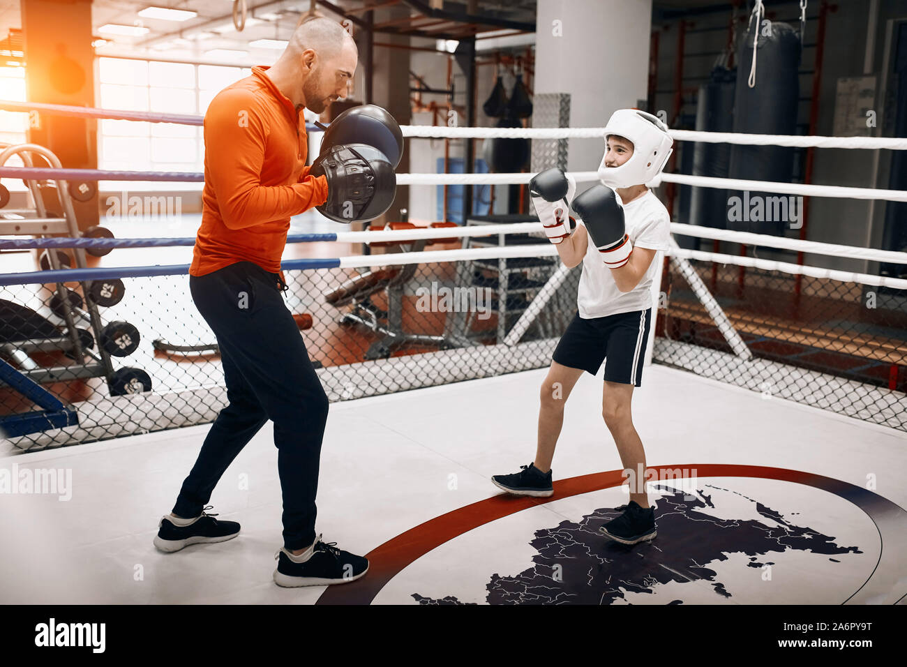 little strong boy learning to box, full length side view photo.leisure ...