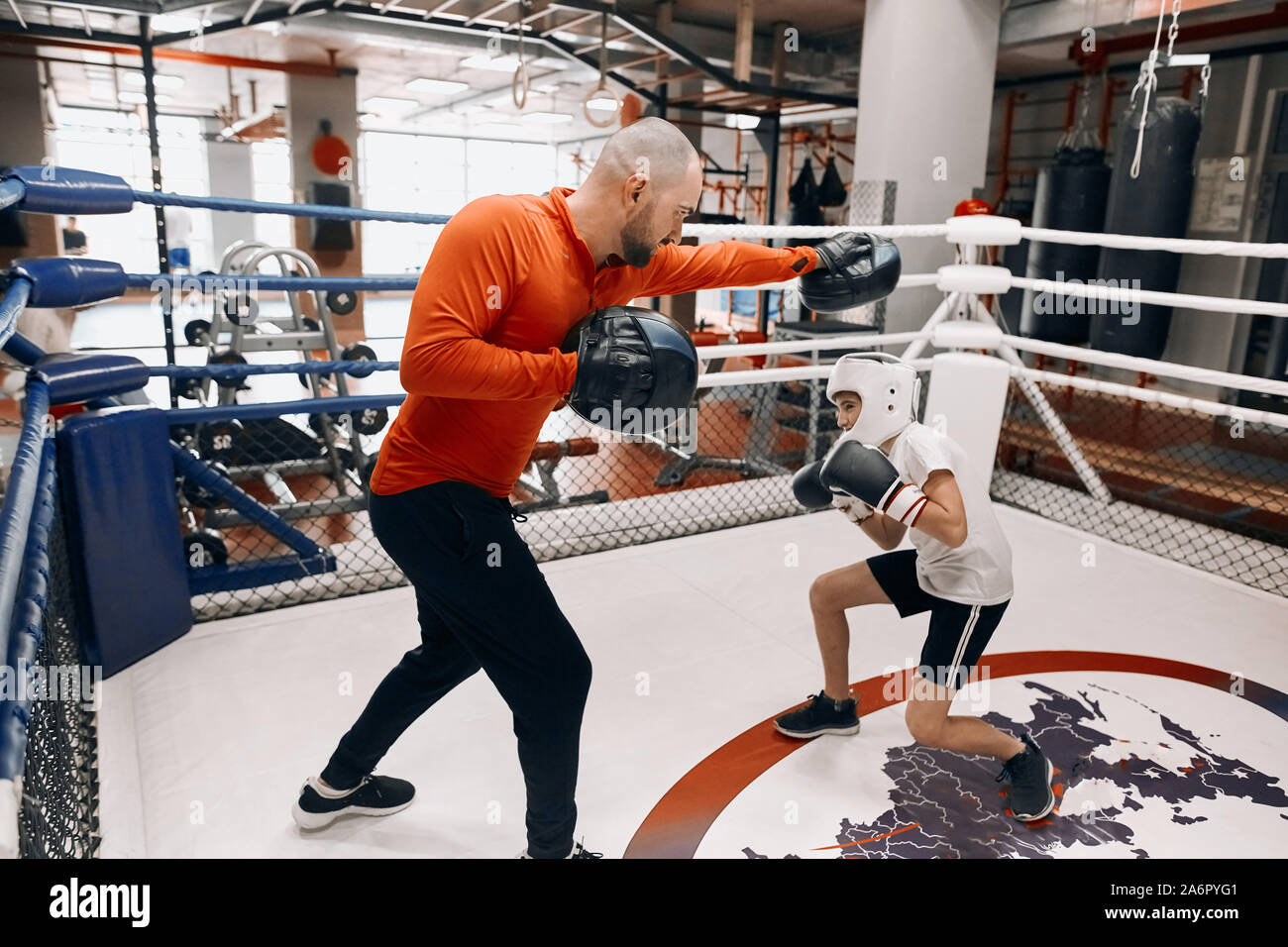 little boy in defense position , trying to avoide punch. close up side ...