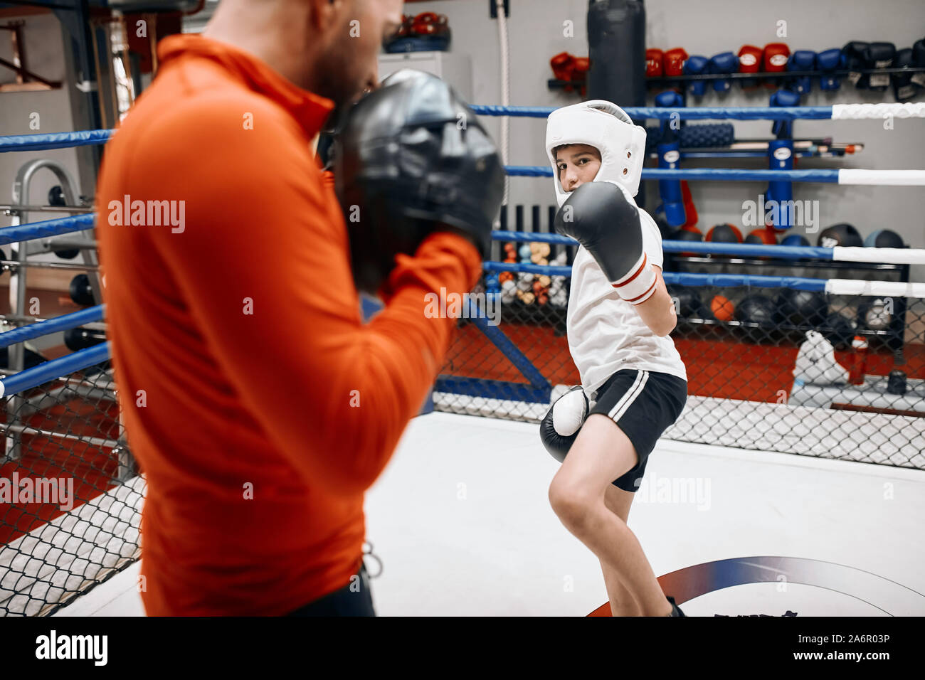 little ambitious kid developing strength, speed and power, close up ...