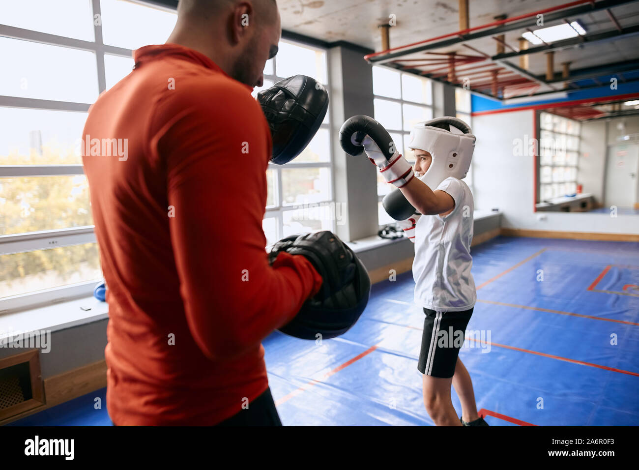 Teaching himself hi-res stock photography and images - Alamy