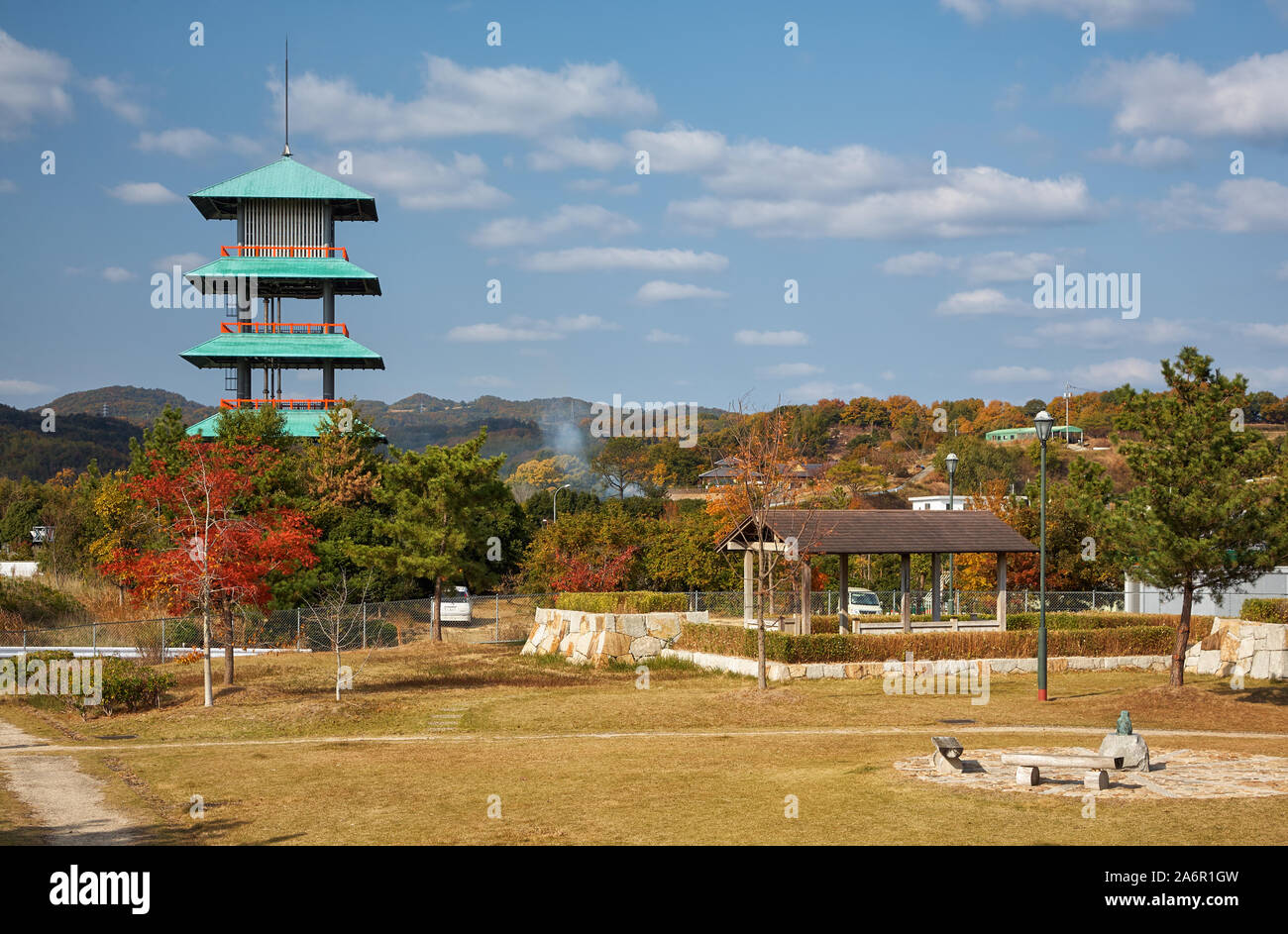 Japanese four-tier tower in the park in Autumn season Stock Photo - Alamy