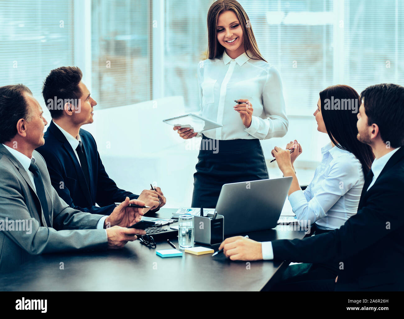 successful business team discussing the plan of work Stock Photo - Alamy