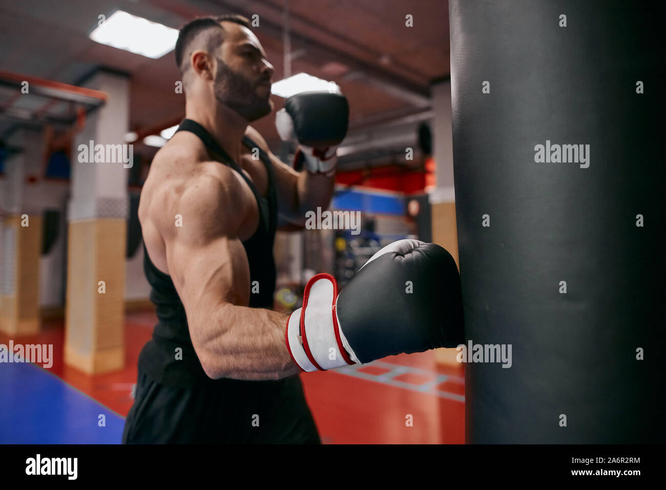 Male boxer throwing punch hi-res stock photography and images - Alamy