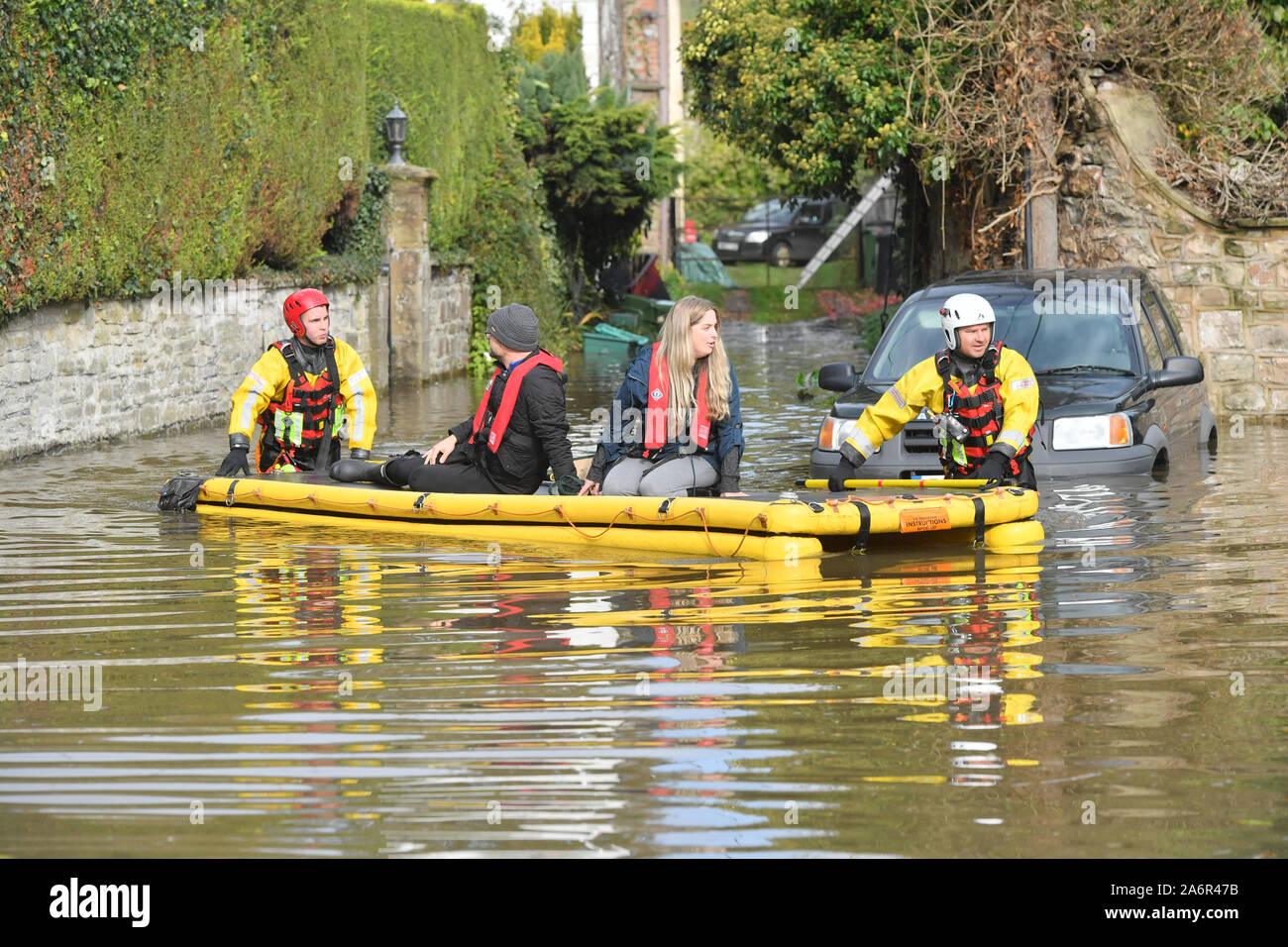 Members of Gloucestershire Fire & Rescue Service rescue residents ...