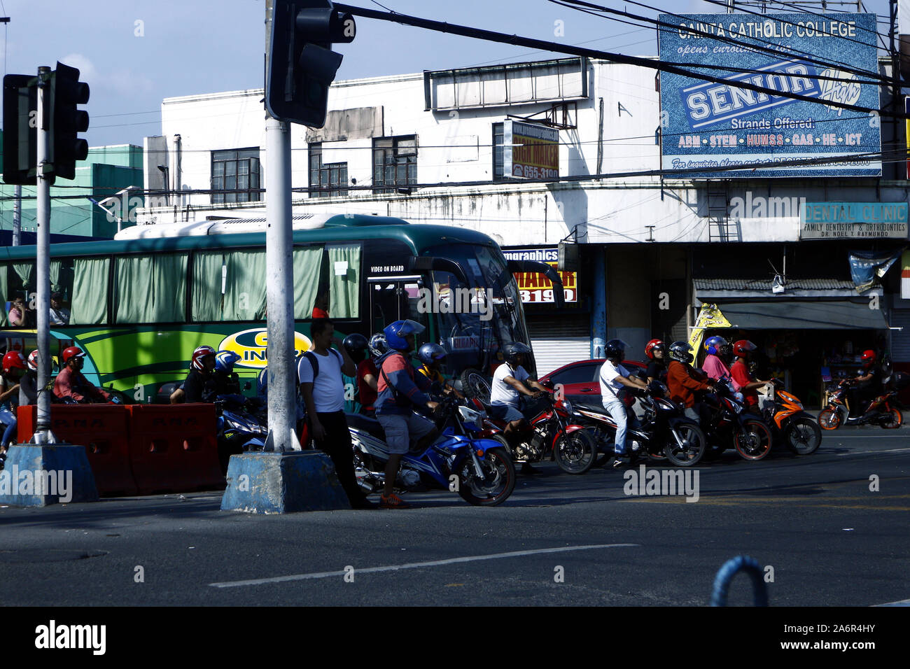 Motorcycles and cars wait for green light hi-res stock photography and ...