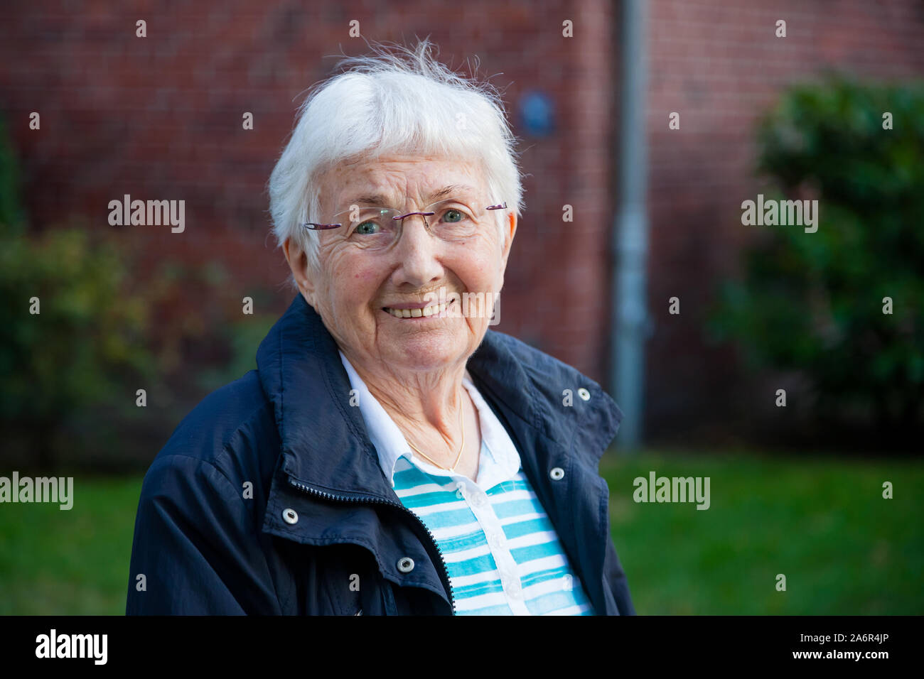 Closeup portrait of active smiling senior lady, over 90 years old ...