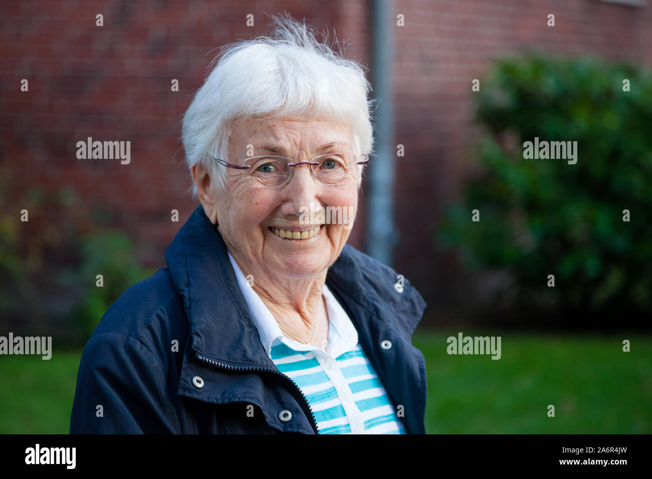 Closeup portrait of active smiling senior lady, over 90 years old ...