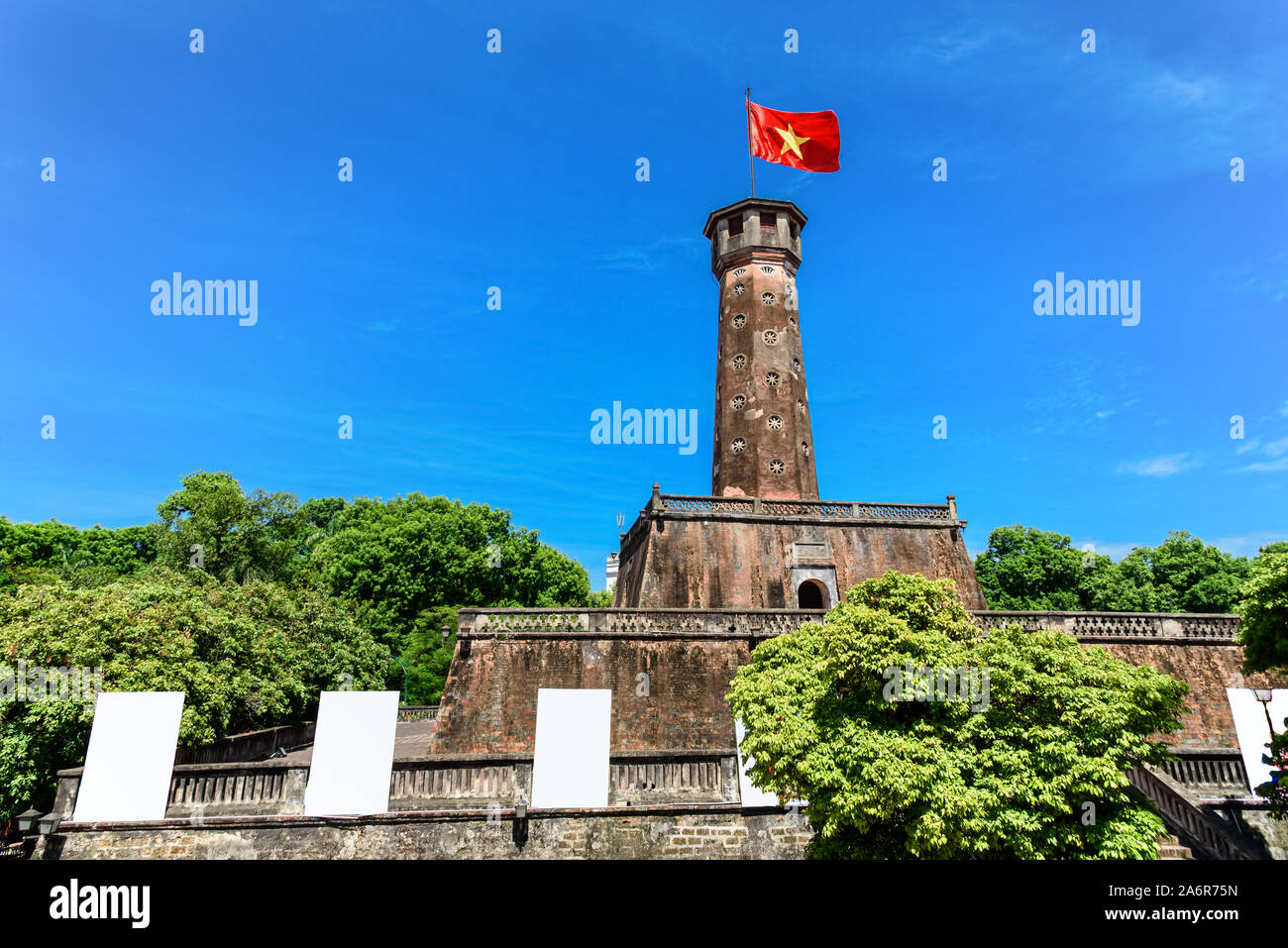 Hanoi flag tower with flying Vietnamese flag and empty standing ...