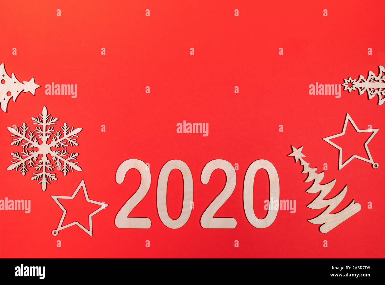 Creative minimal Xmas mockup on red background with diy wooden ...