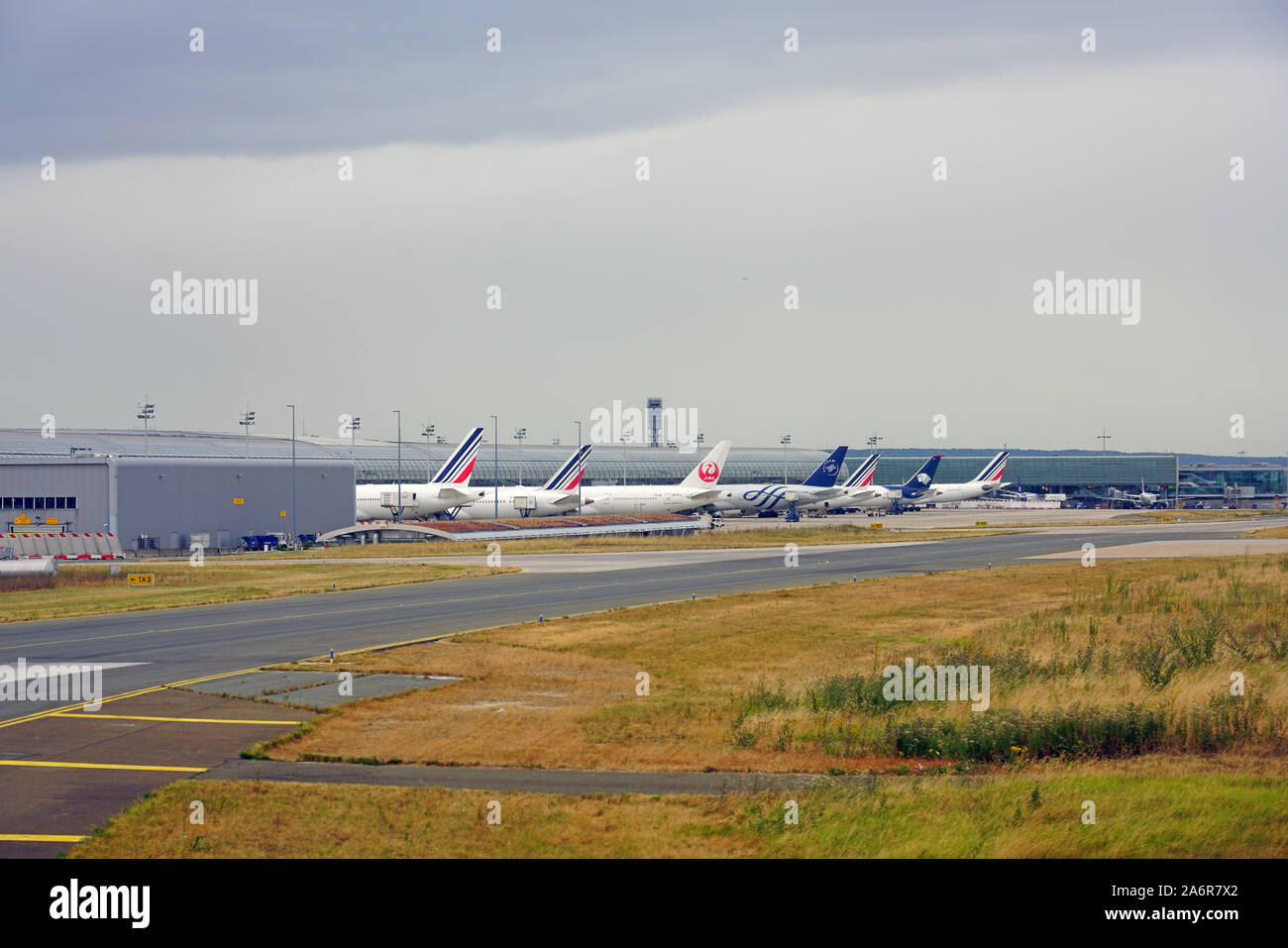 PARIS, FRANCE -18 JUL 2019- View of airplanes at the Roissy Charles de ...