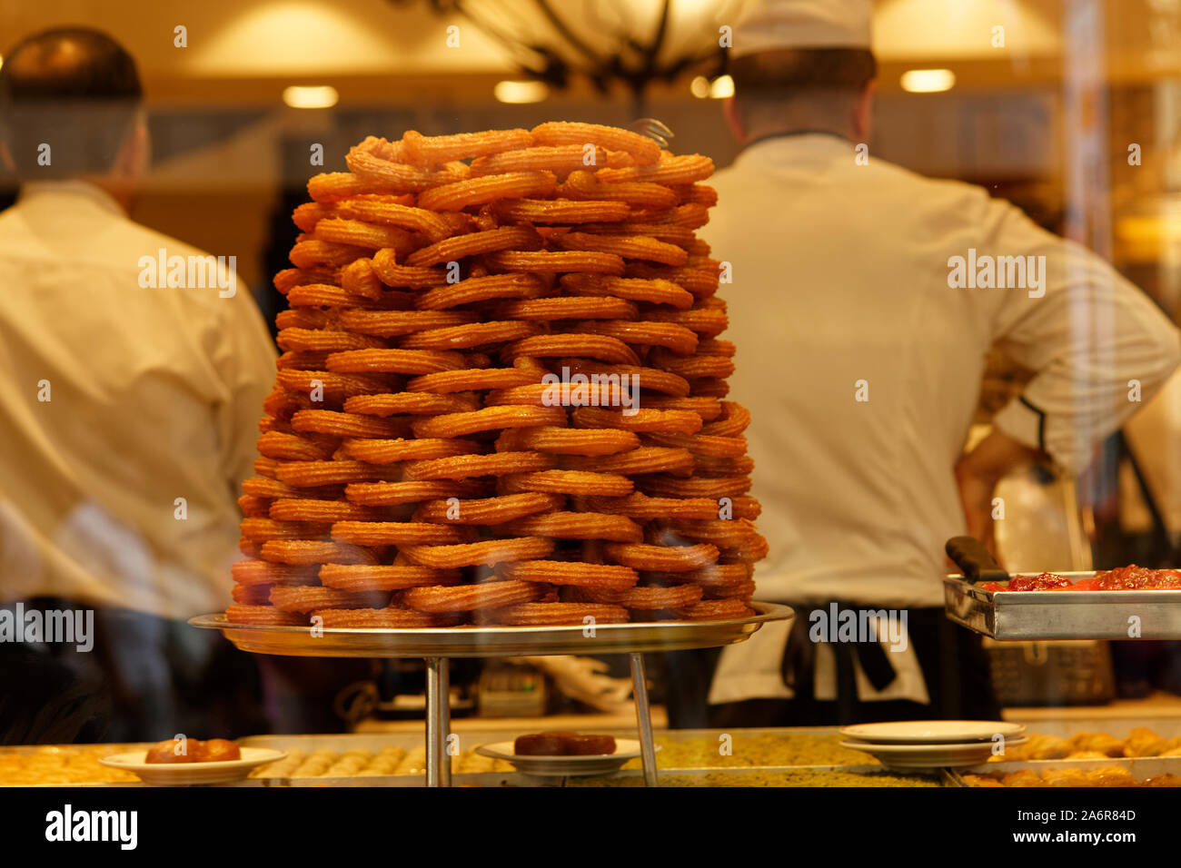 Deep fried sugar dough. Bunch of traditional ring dessert - syrup ...