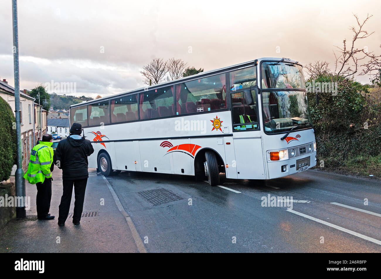 passenger school bus coach stuck on icy hill road winter Stock Photo ...