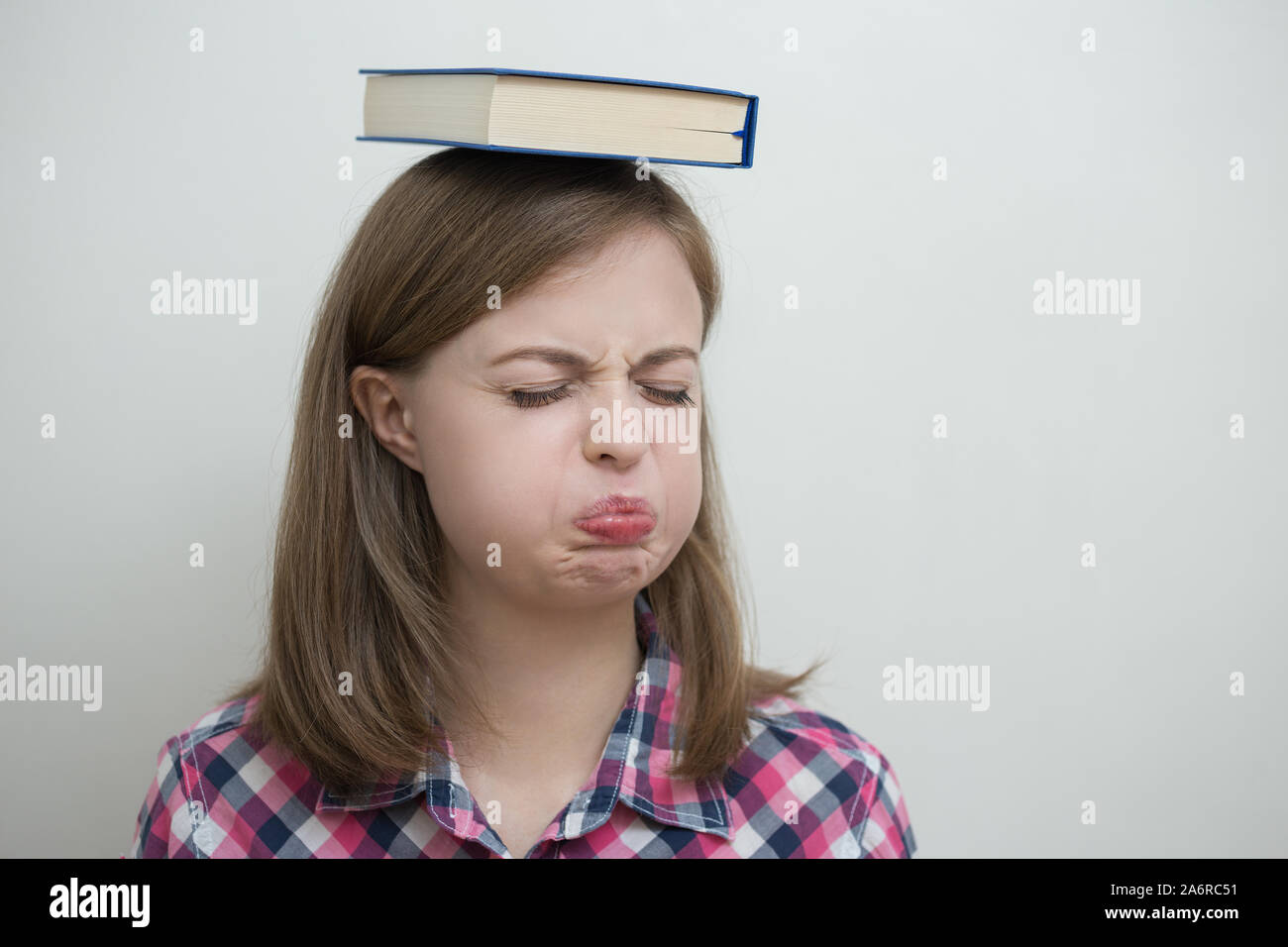 Young caucasian girl woman, reading a book Stock Photo - Alamy