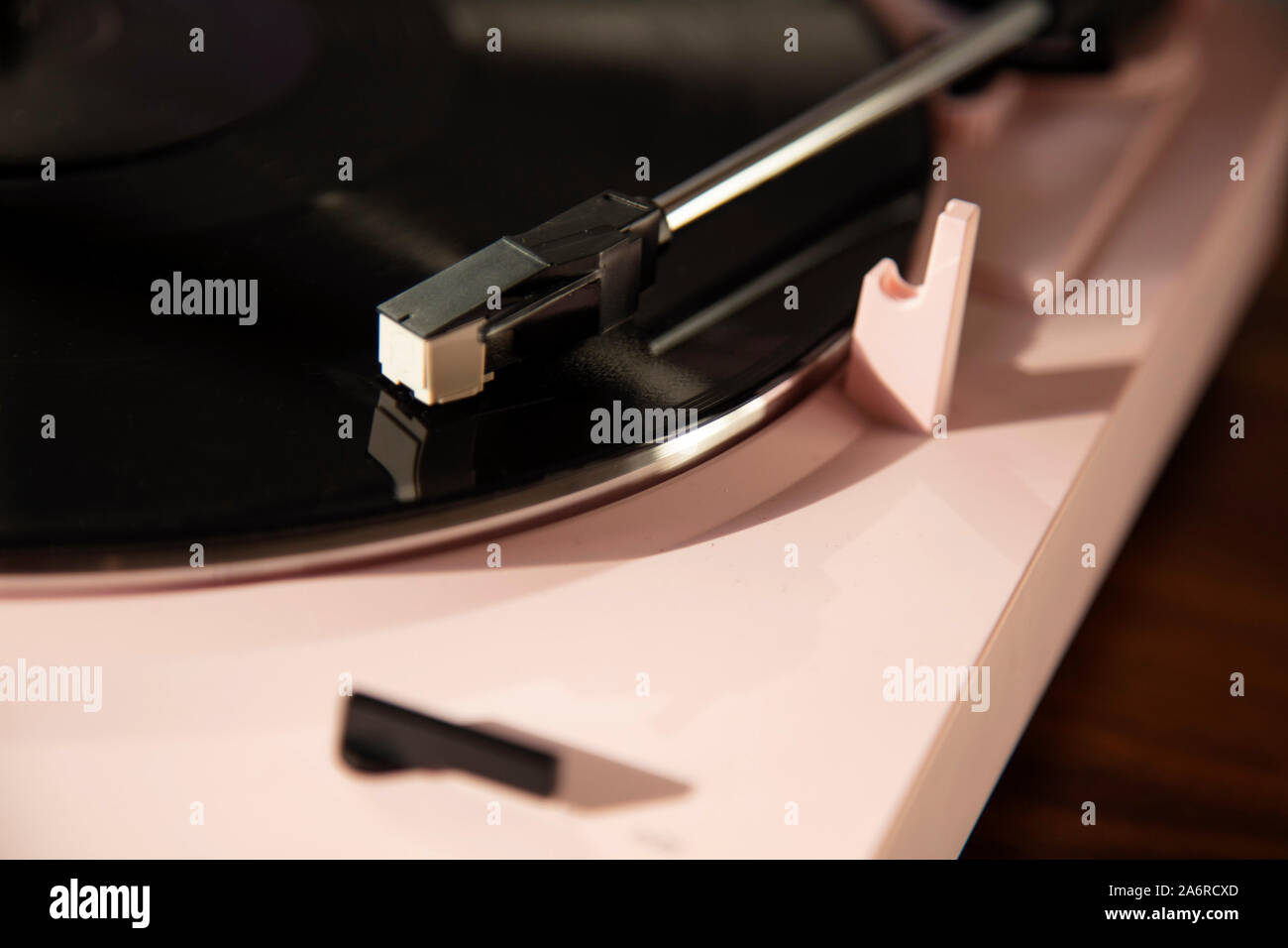 Vintage music record player with a vinyl record Stock Photo - Alamy