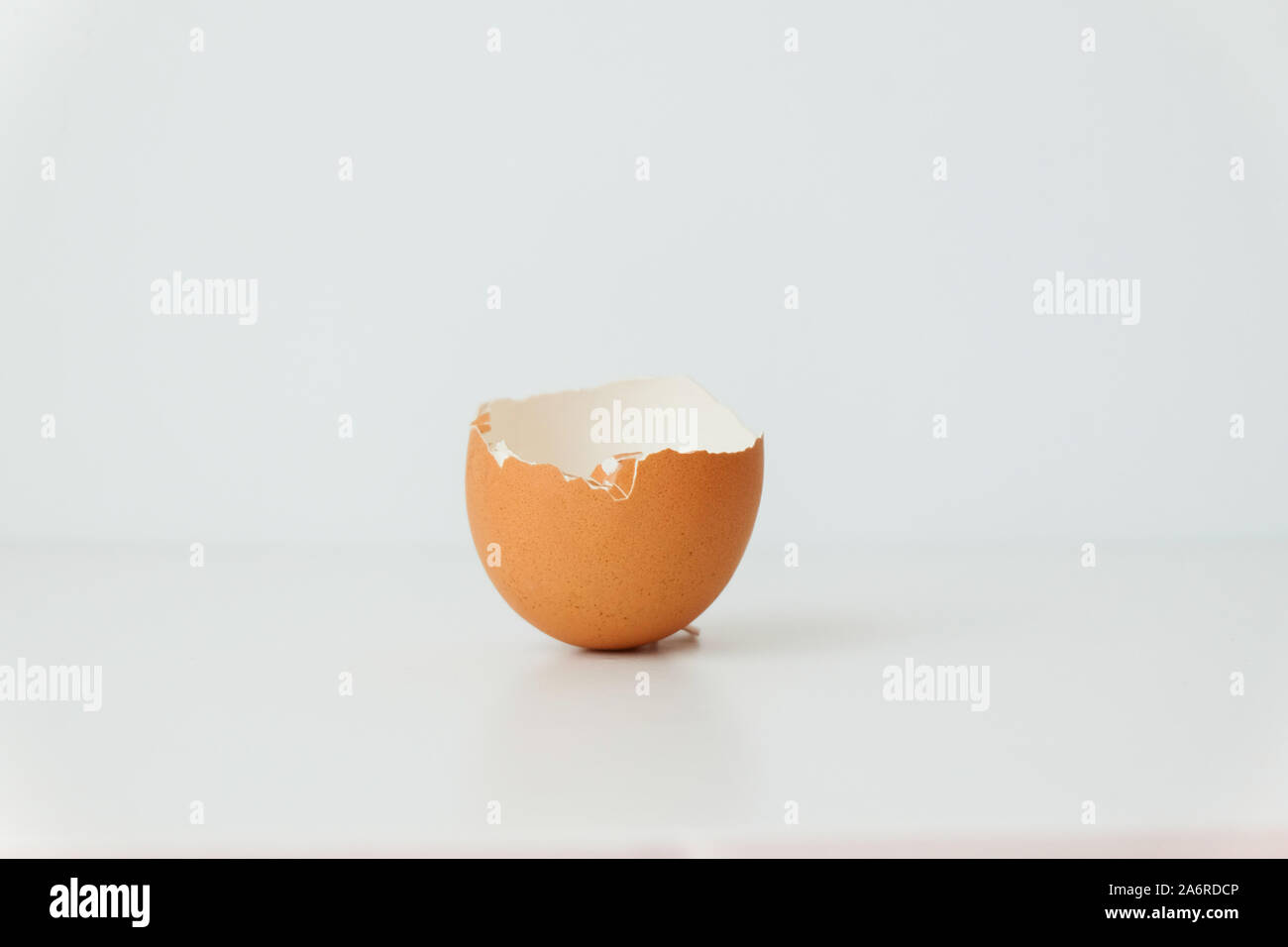 half broken eggshell isolated on white background Stock Photo - Alamy