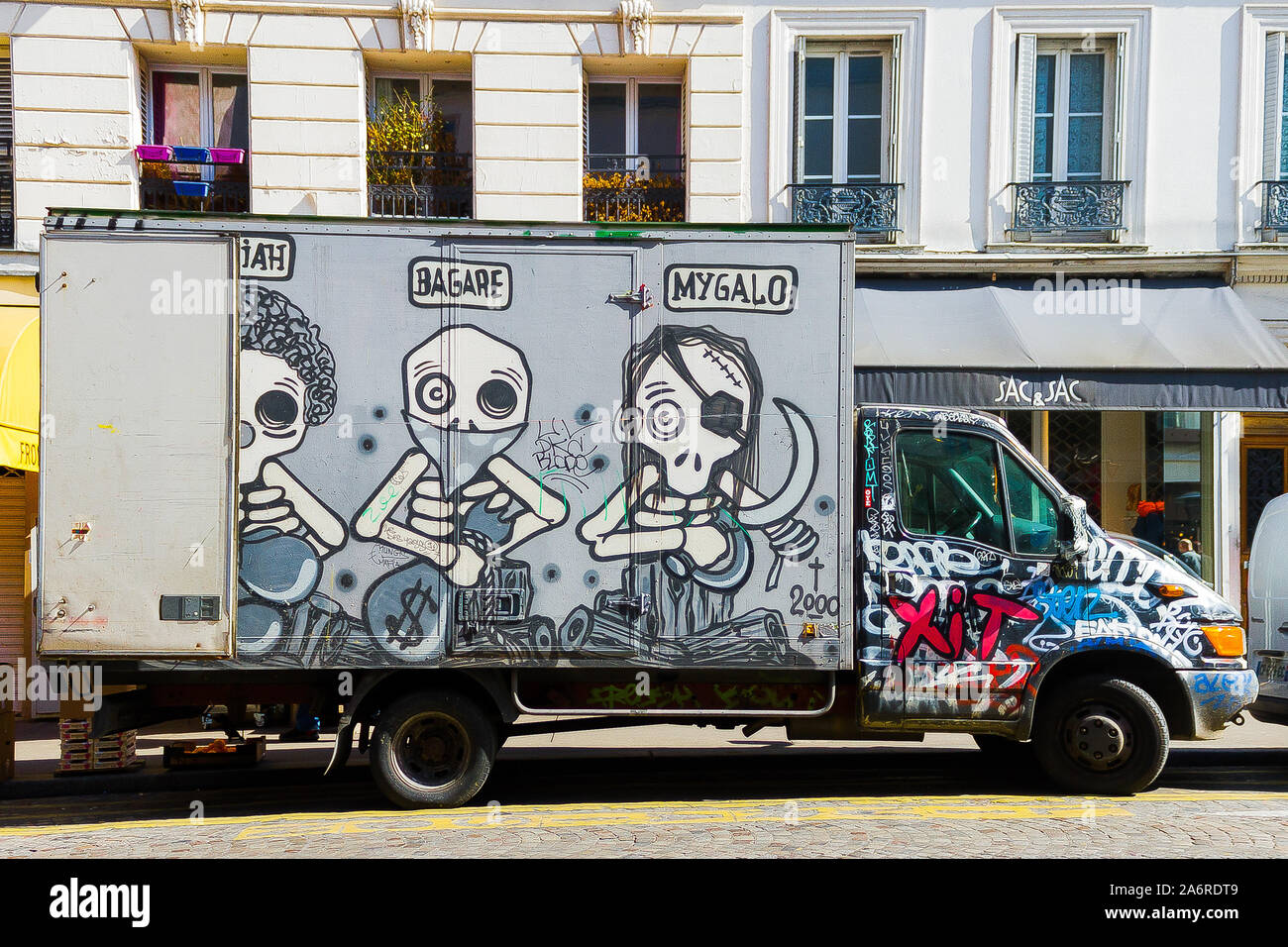 Graffiti covered van in Paris Stock Photo - Alamy