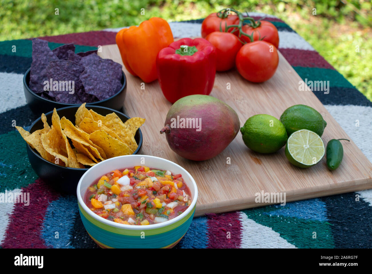 Fresh Organic Mango salsa with Organic Blue and Yellow Corn Chips close ...