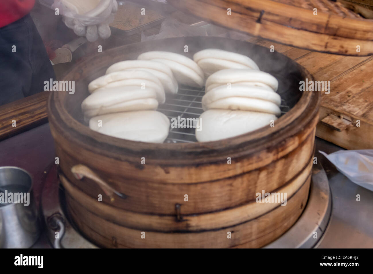 Steamed Taiwanese Guo Bao Buns in a Bamboo Steamer Stock Photo - Alamy