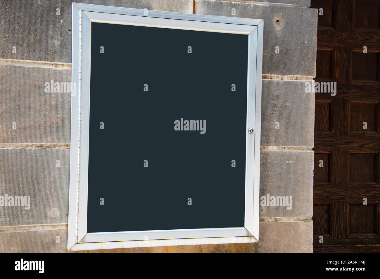 Sign attached a brick building hi-res stock photography and images - Alamy