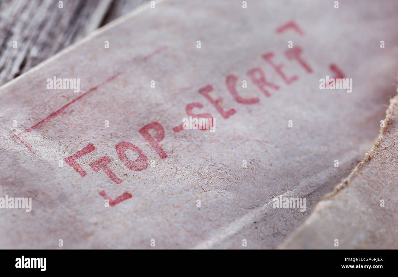 Top secret stamp sign in brown pepper Stock Photo - Alamy