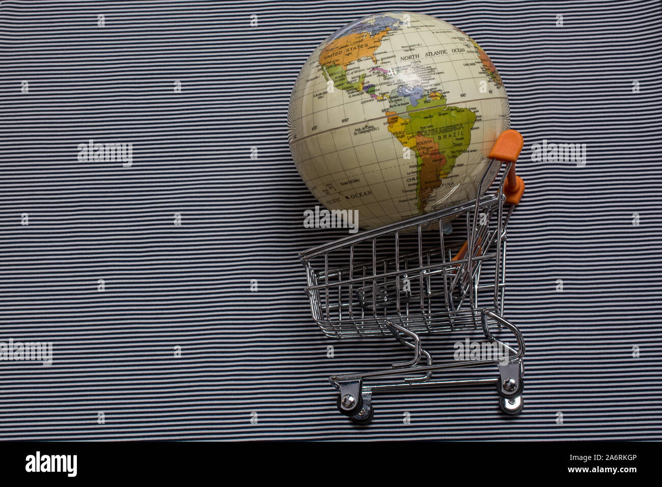 World Globe and Shopping cart or shopping trolley as business concept ...