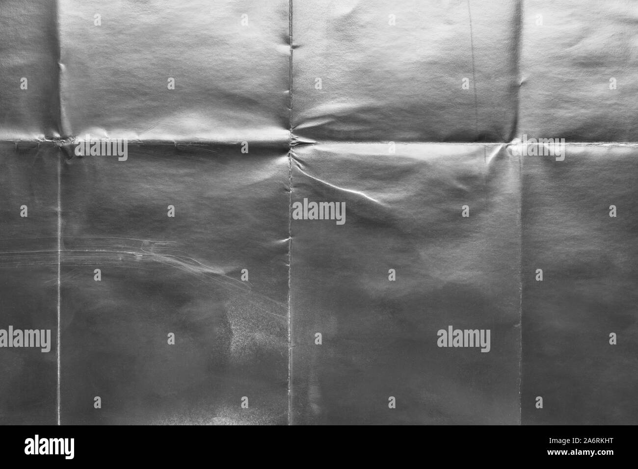 Silver wrapping paper with scratches and folds, texture background ...