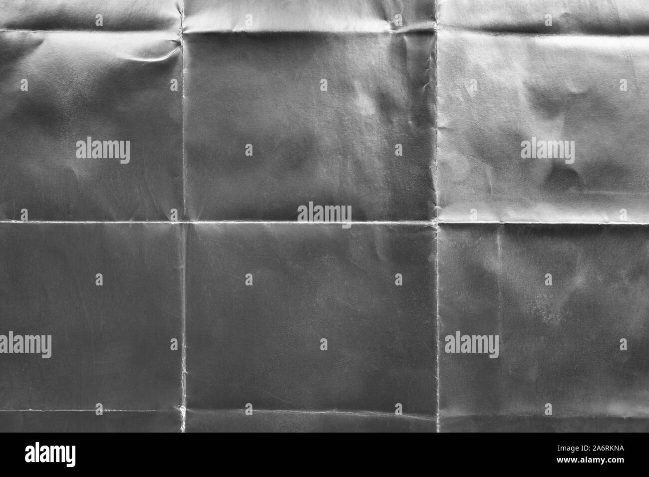 Silver wrapping paper with scratches and folds, texture background ...