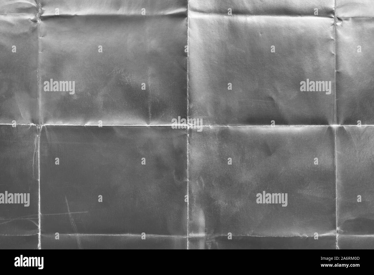 Silver wrapping paper with scratches and folds, texture background ...